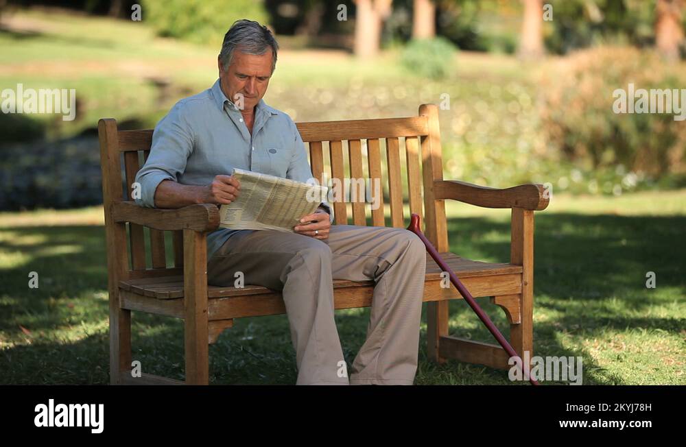 Man sitting bench reading book Stock Videos & Footage - HD and 4K Video ...