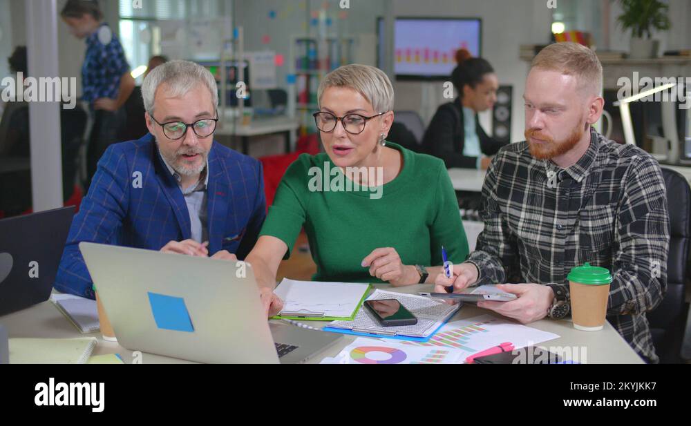 Three office people sitting Stock Videos & Footage - HD and 4K Video ...