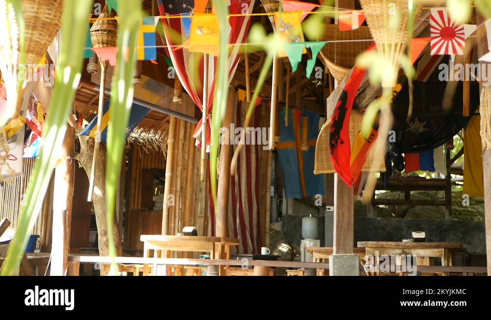 Decorative national flags of different countries hanging on strings in ...
