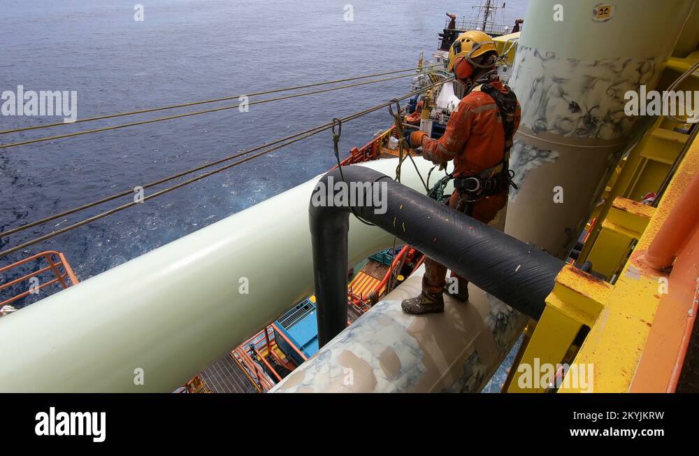 Offshore workers working at height and overboard Stock Video Footage ...