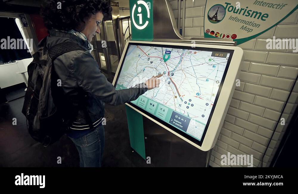 Traveler find the best route on interactive info touch screen metro map Stock Video Footage - Alamy