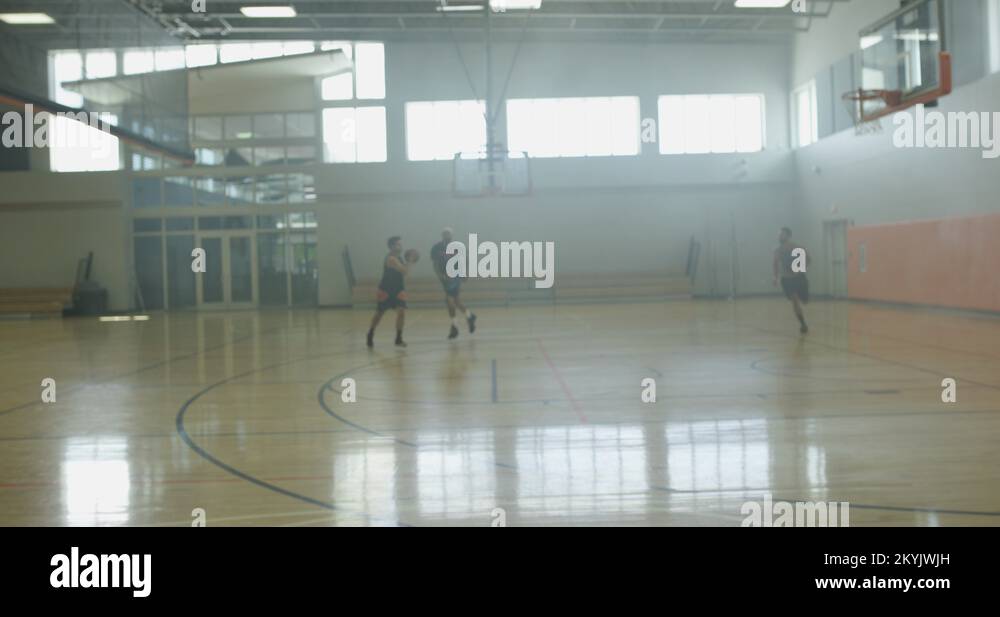 Male basketball players passing the ball back and forth Stock Video ...