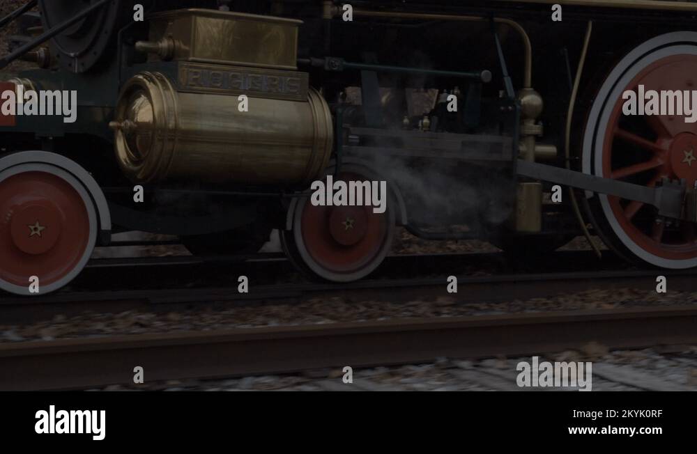 19th century Steam train - locomotive - travels down gauge train tracks ...