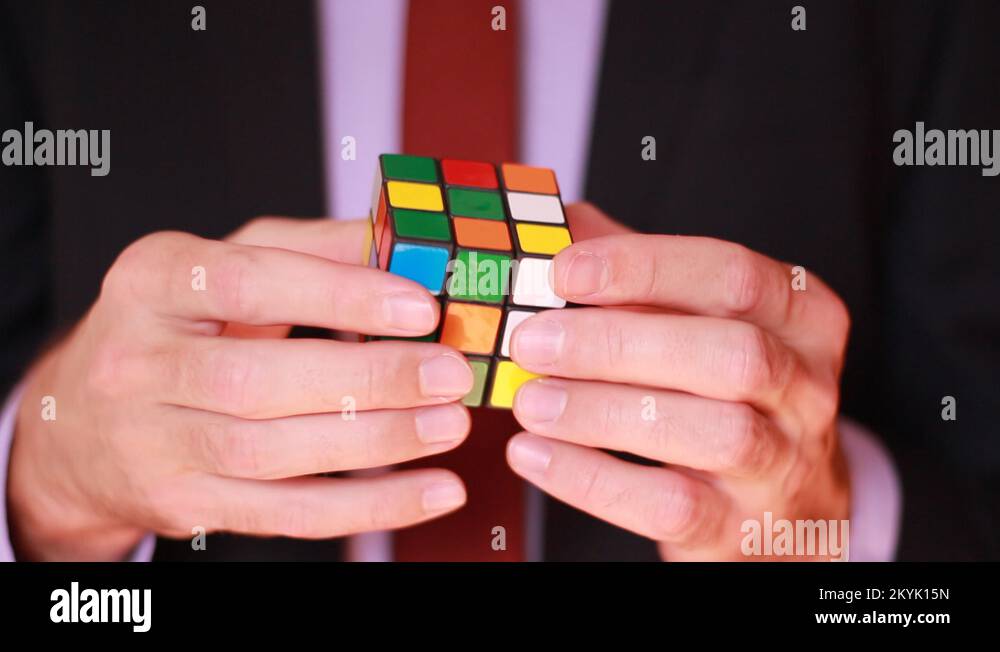Rubik's cube in male hands Stock Video Footage - Alamy
