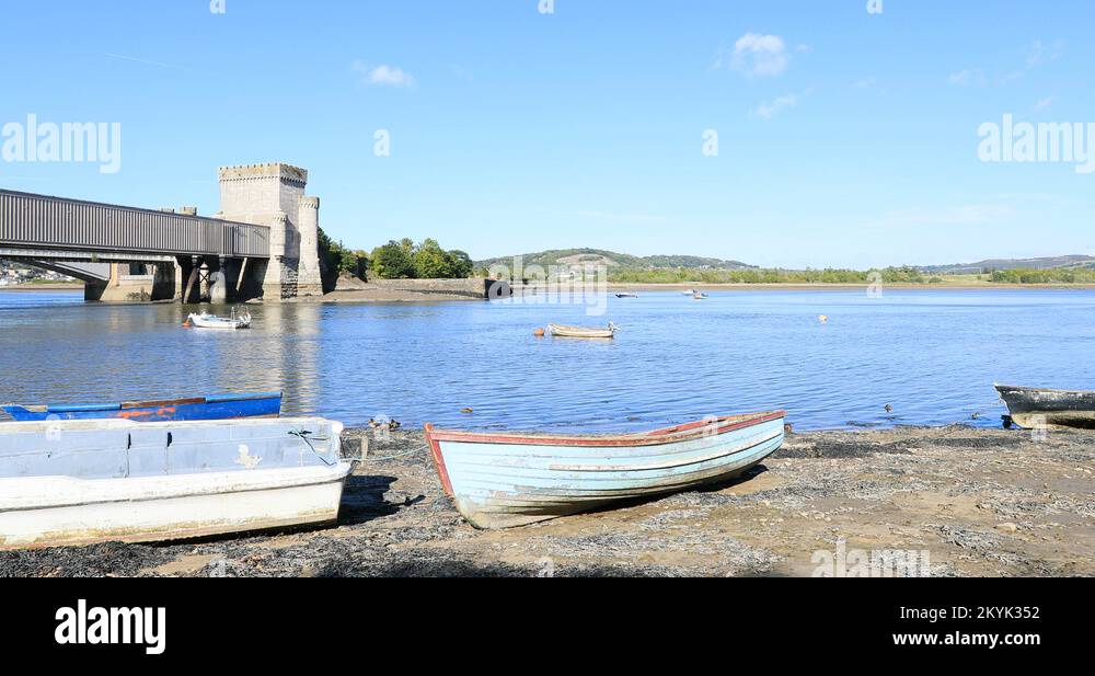 Conwy Castle river bridge boats in mud Wales pan 4K Stock Video Footage ...