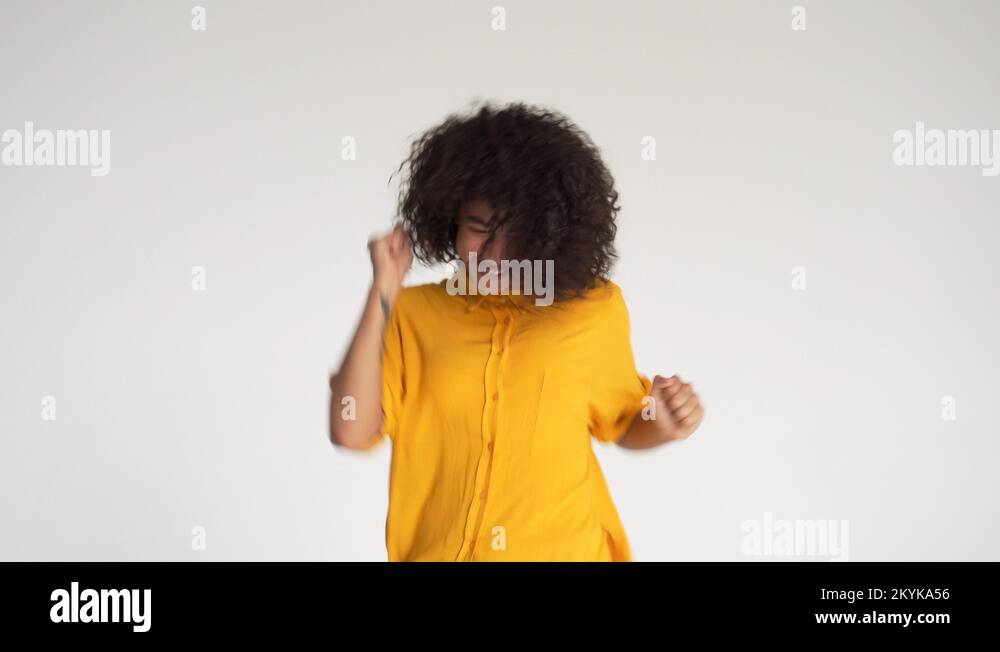 Ecstatic woman dancing and celebrating success Stock Video Footage - Alamy