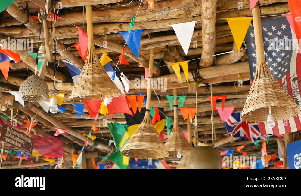 Decorative national flags of different countries hanging on strings in ...