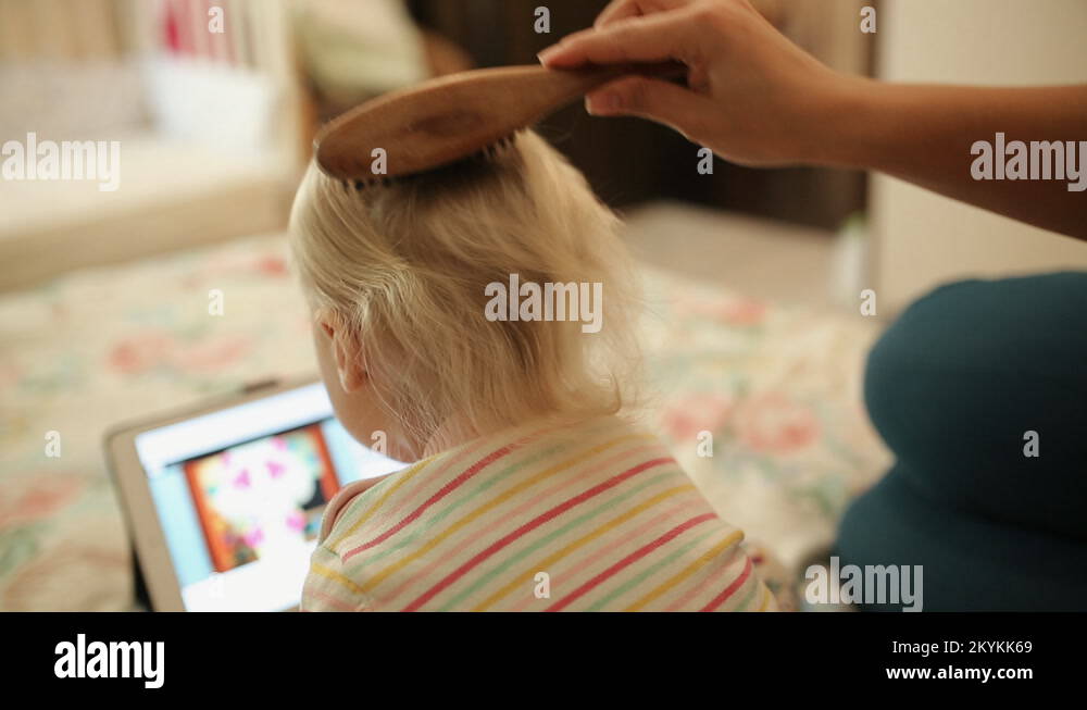 Combing sitting Stock Videos & Footage - HD and 4K Video Clips - Alamy