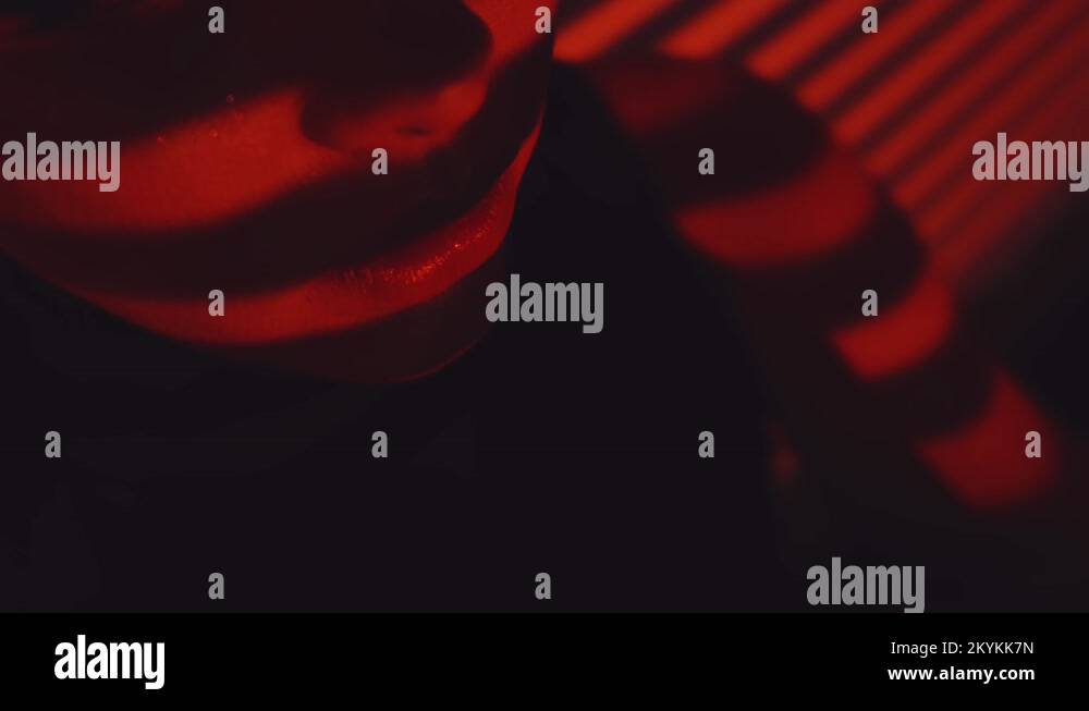 Projection of black and red lines on the girl's face and lips Stock ...