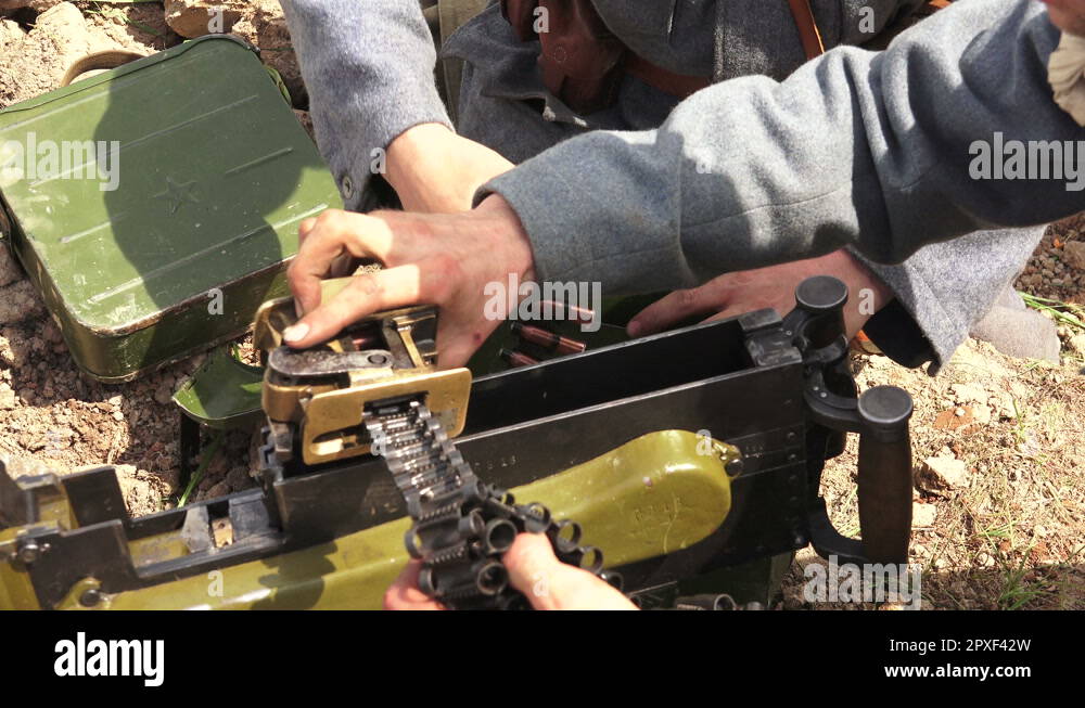 The soldier puts machine-gun tape in a drawer. The first world war.WWI ...
