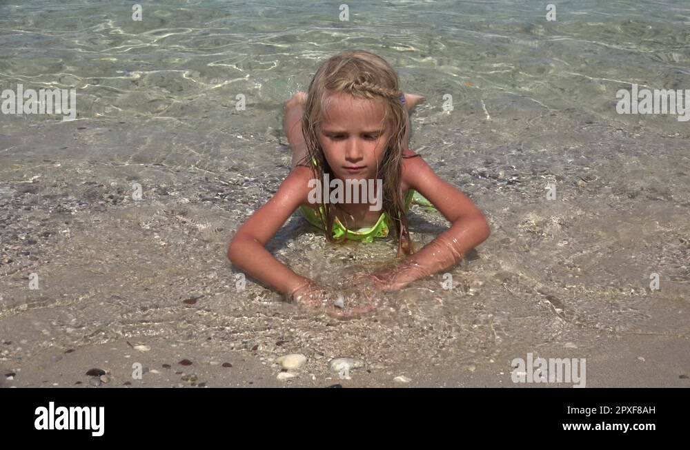 4K Child, Girl Swimming in Sea Water on Beach, Kid Playing, Bathing on ...