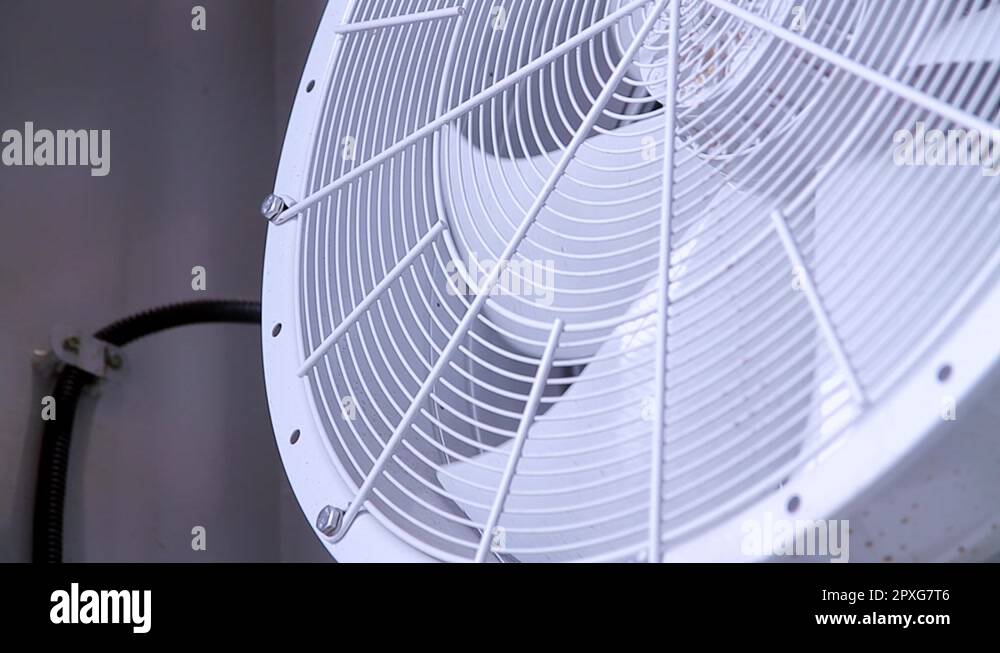 A fan rotates at power transformer at electric substation Stock Video ...