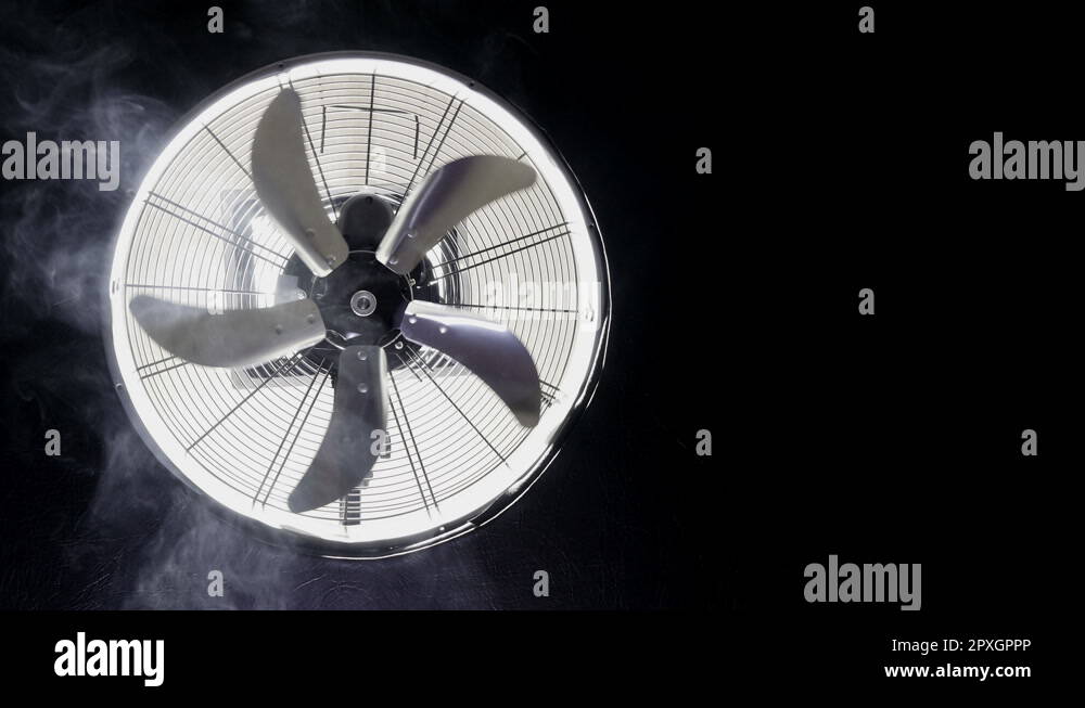 Slow rotating ventilation fan in smoke Stock Video Footage - Alamy