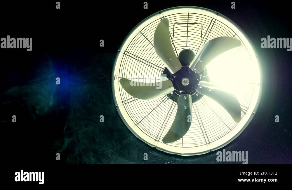 Slow rotating ventilation fan in smoke Stock Video Footage - Alamy