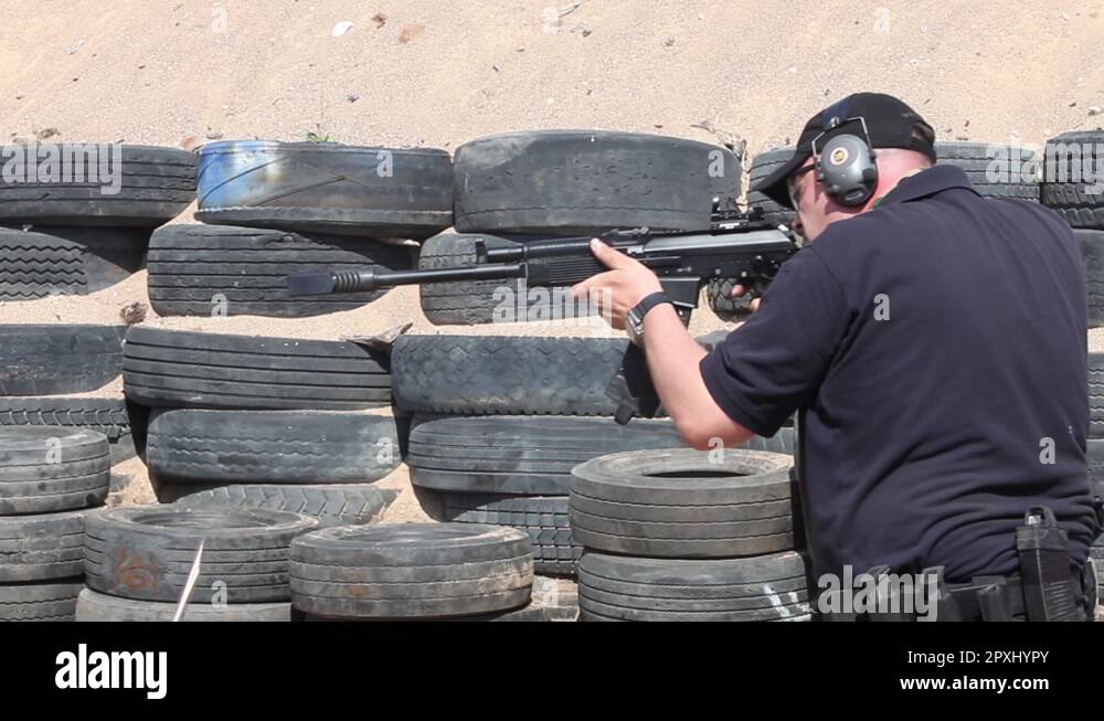 Man shooting machine gun Stock Videos & Footage - HD and 4K Video Clips ...