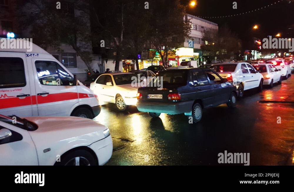 Ambulance & police car stuck in traffic jam in Tehran capital of Iran ...