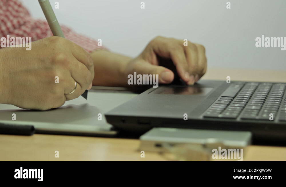 Designer edit on your computer using a graphic tablet Stock Video ...