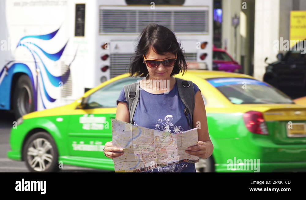 Tourist reading street map Stock Videos & Footage - HD and 4K Video ...