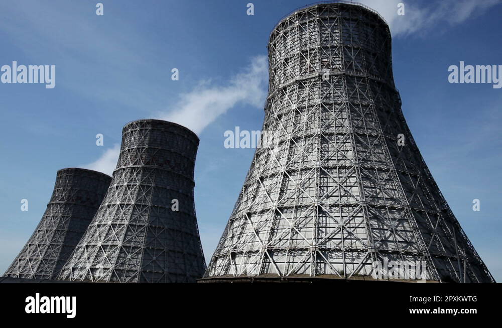 The cooling system of a nuclear reactor. Three cooling towers Stock ...