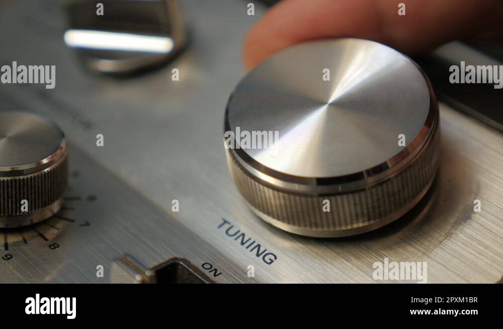 Ancient FM radio tuner adjusting stations and frequency close-up 4K ...