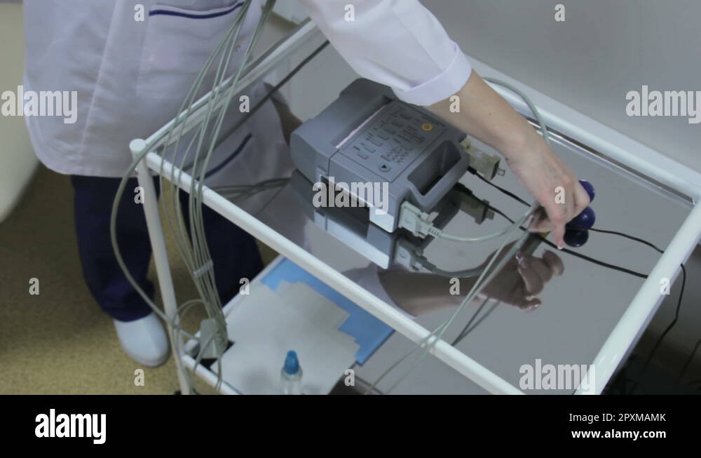 Doctor cardiologist takes a sensors ECG devices cardiogram Stock Video ...