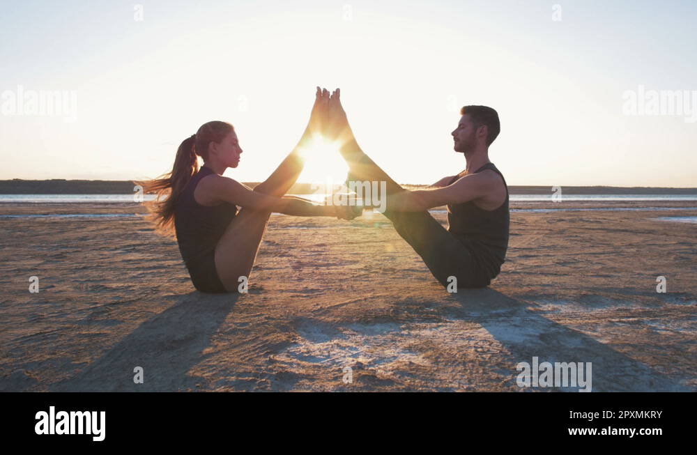 Boat pose couple yoga Stock Videos & Footage - HD and 4K Video Clips ...