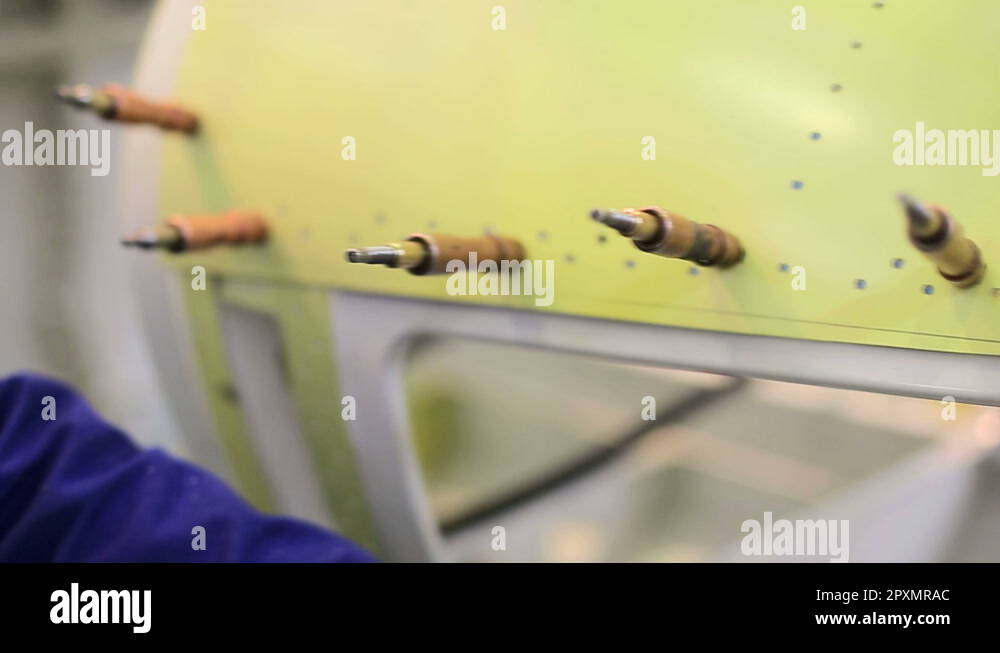 Install bolts with a pneumatic or hydraulic tool to fuselage of ...