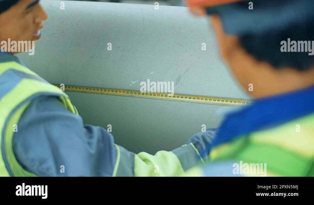 Measure workers Stock Videos & Footage - HD and 4K Video Clips - Alamy