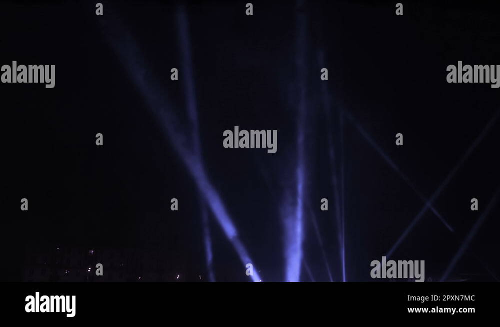 Rays of light from the spotlights in the night sky Stock Video Footage ...