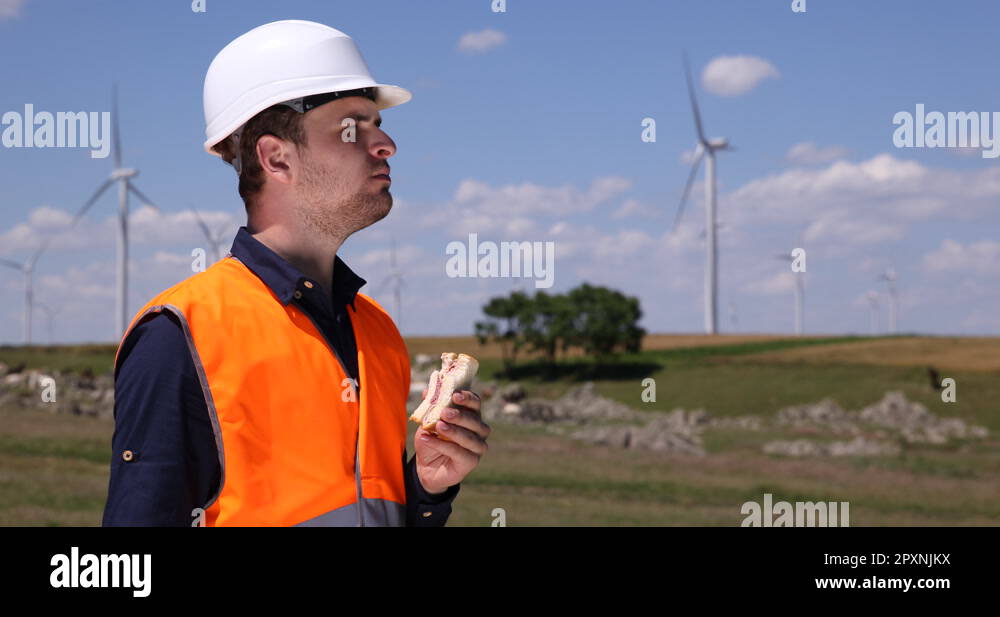 Wind Turbines Field Worker Man Eating Sandwich Lunch Break Windpower ...