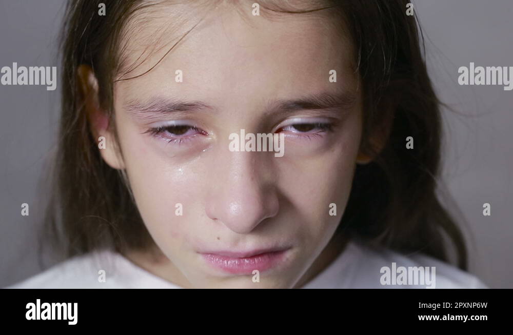 little girl crying with tears rolling down her cheeks Stock Video Footage - Alamy