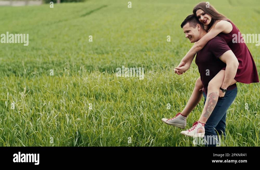 Two men carrying woman on hands Stock Videos & Footage - HD and 4K ...