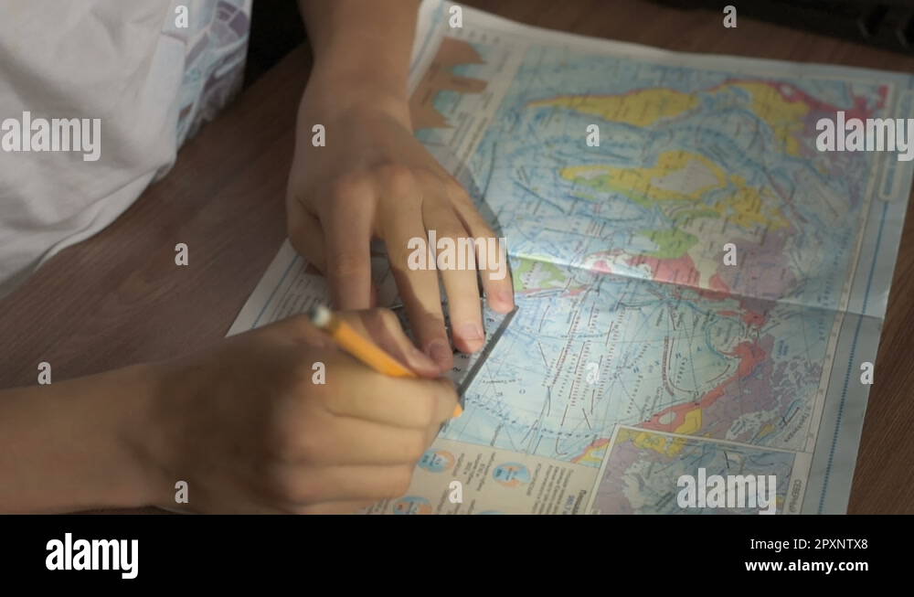 Little boy learning geography - looking at maps and the globe Stock ...