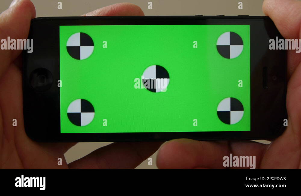 Cell Phone, touch screen, held by hands. Green screen Chroma Key. Close ...