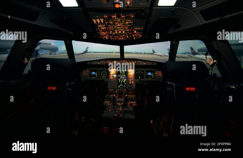 Empty workplace of aircraft pilots. Cockpit or flight deck of a modern ...