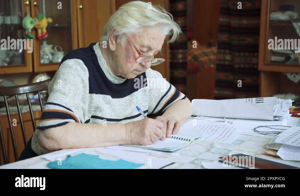Elderly woman writing Stock Videos & Footage - HD and 4K Video Clips ...