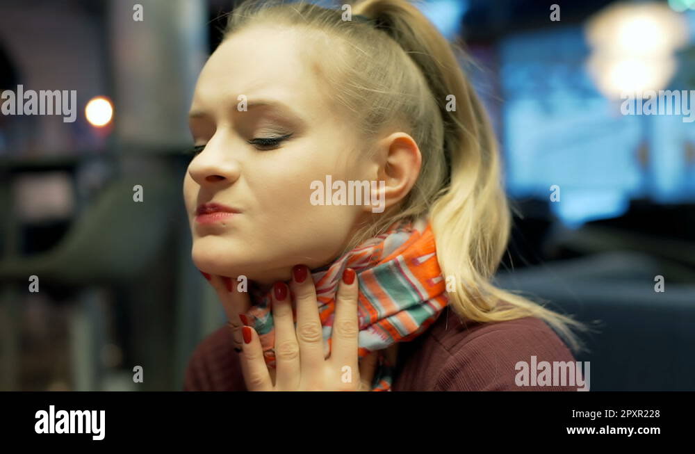 Sore throat scarf Stock Videos & Footage - HD and 4K Video Clips - Alamy