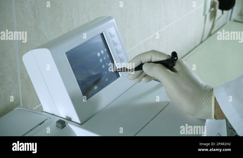 Male hand entering the data on the touchscreen display of medical ...