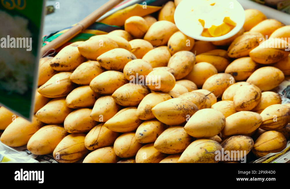 Fresh mango. On floating market in Thailand. A large number of mango ...