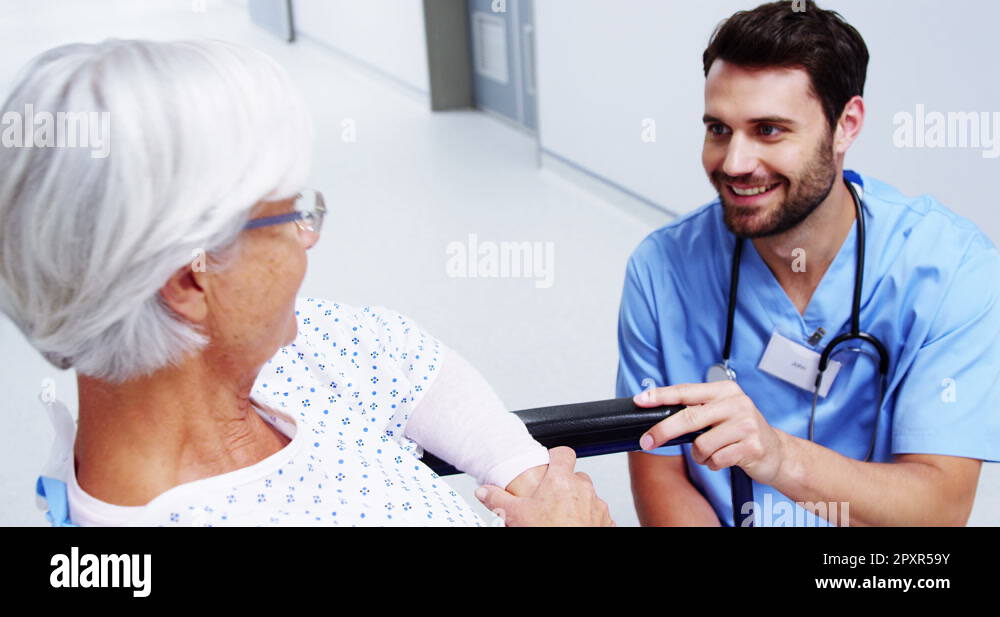 Nurse having a conversation with female senior patient Stock Video ...