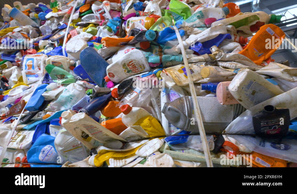 Pet bottle ready for recycling in a garbage sorting center. Dolly shot ...
