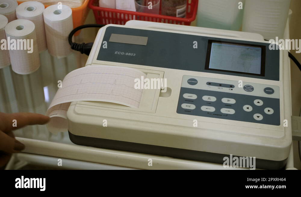 Electrocardiograph. Procedure of electrocardiogram to diagnose heart ...