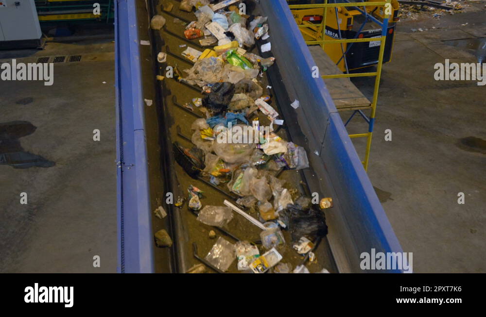 Conveyor belt carrying waste. Waste disposal plant.4K Stock Video ...
