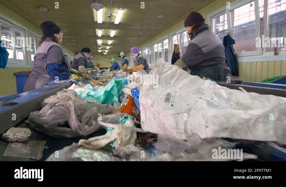 Waste sorting at waste disposal plant. Steadicam. 4K Stock Video ...