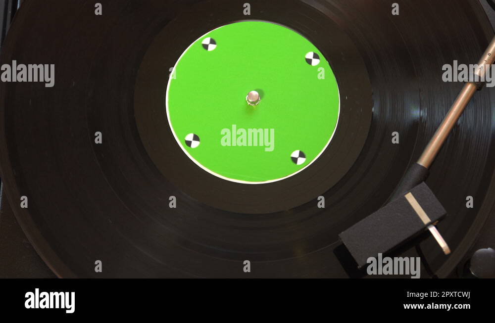 Vinyl record pleer. Plays song from an old turntable 4k top view Stock ...