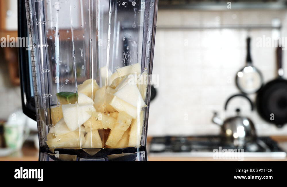 Making pineapple strawberry fruit shake in blender 4K Stock Video ...