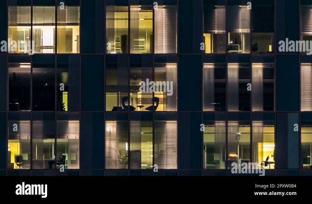 window of the multi-storey building of glass and steel lighting and ...