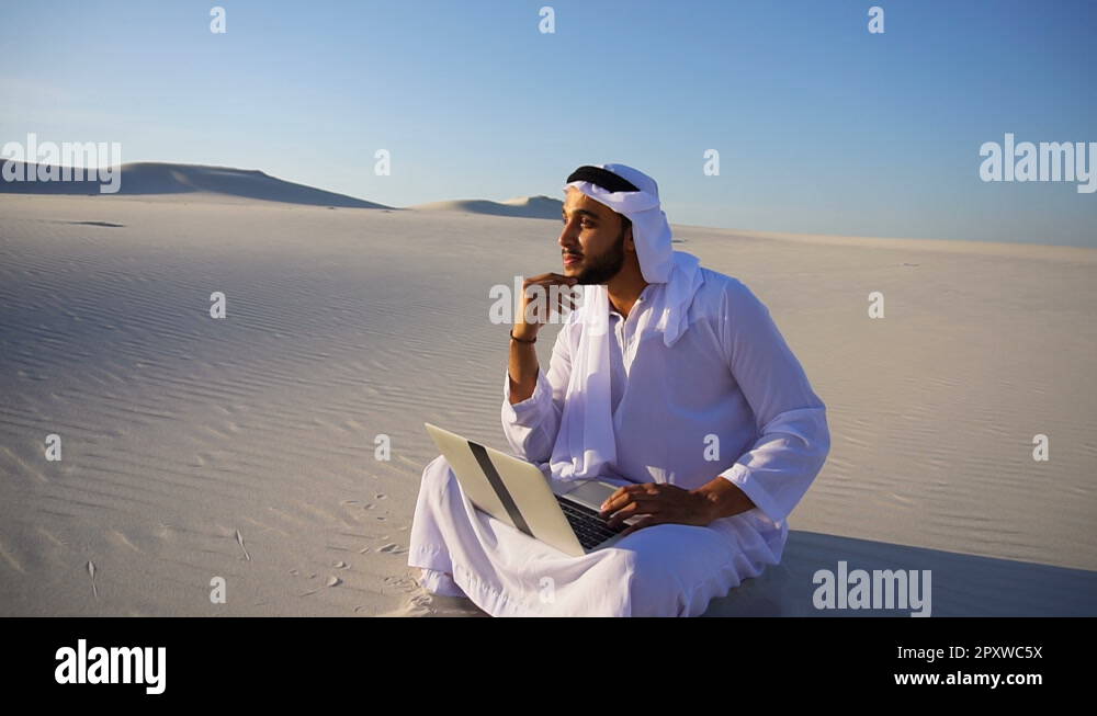 Emirati Arabian UAE Sheikh professional designer with computer projects ...