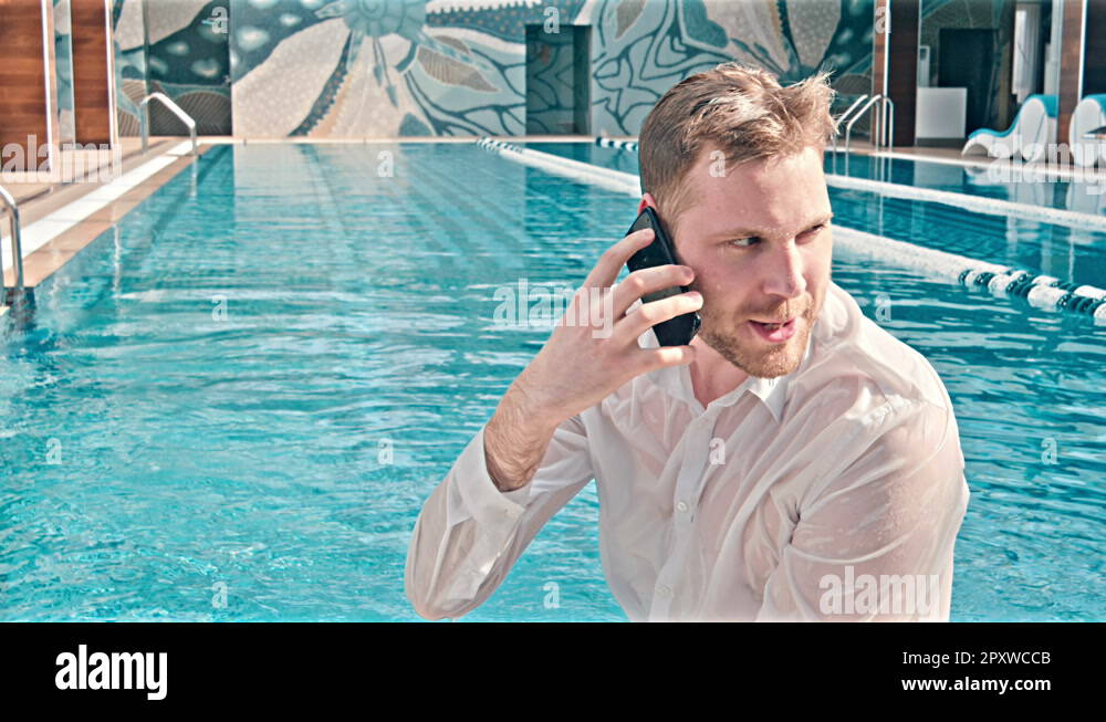Using phone pool Stock Videos & Footage - HD and 4K Video Clips - Alamy