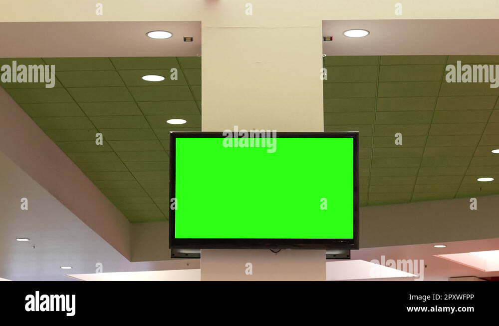 Motion of green screen tv for your ad on wall at food court area Stock ...
